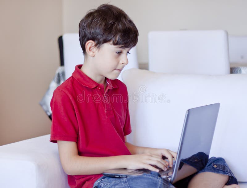 Young Boy is Using Computer Stock Image - Image of happy, 12years: 50612581