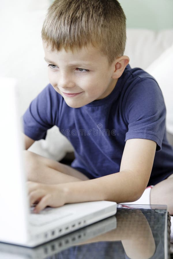 Young Boy Using a Laptop Computer Stock Photo - Image of school ...