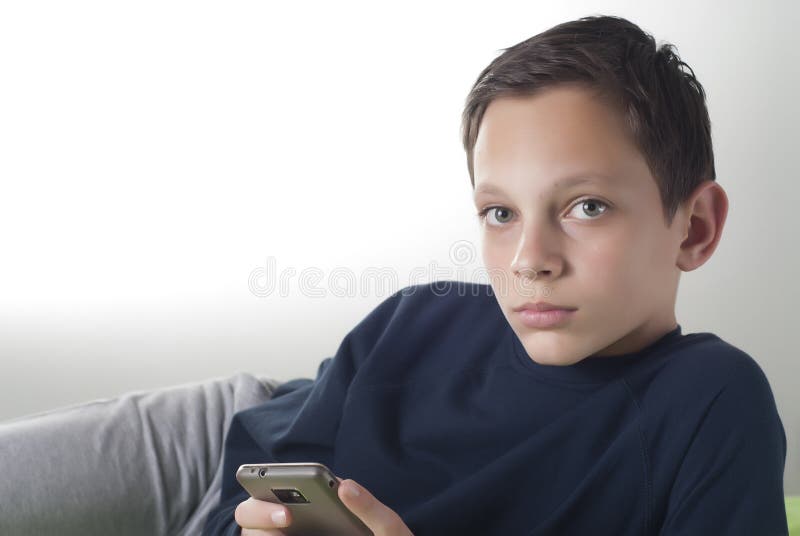 Young Boy Using a Smart Phone Stock Image - Image of caucasian, people ...