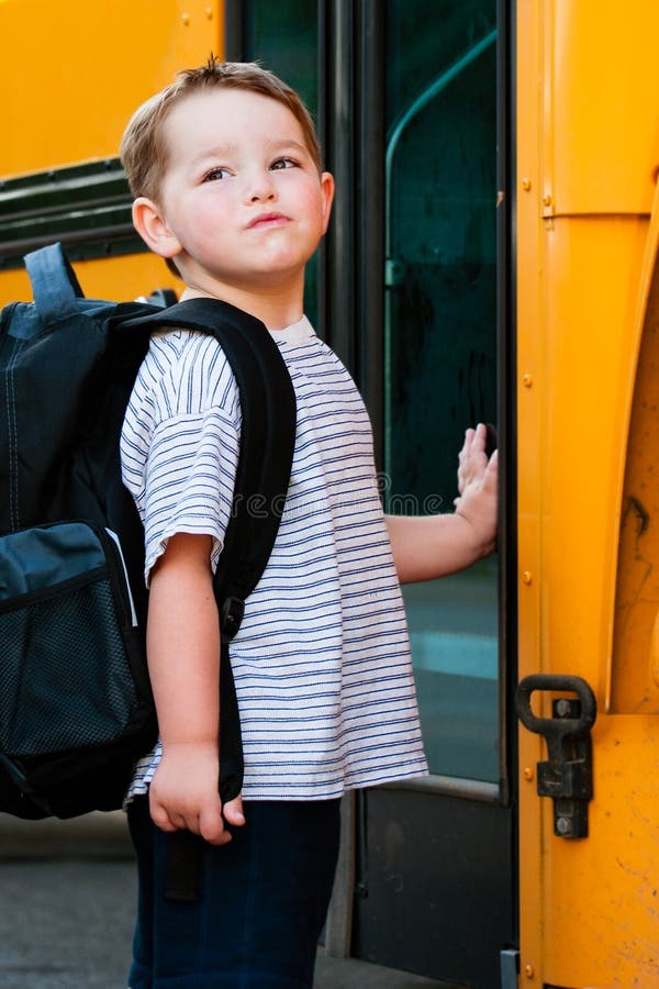 Cute Young Boy, Kid Getting on the School Bus, Ready To Go To School ...