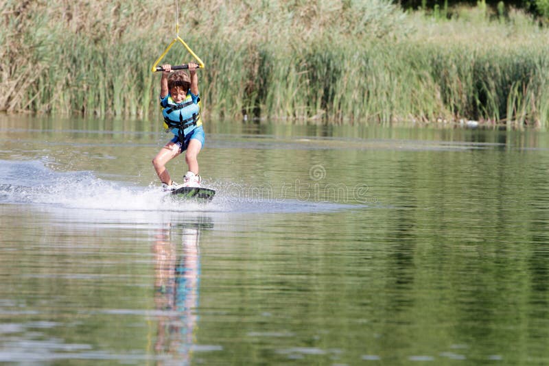 Young boy wakeboarding stock photo. Image of lesson, active - 33134434