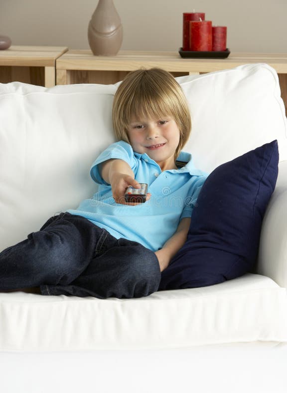 Young Boy Watching Television at Home Stock Photo - Image of camera ...