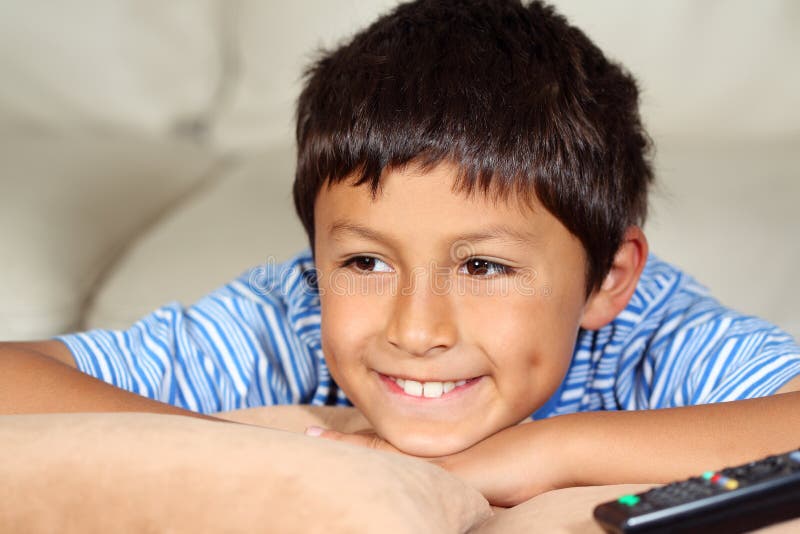 Young boy watching TV stock photo. Image of remote, little - 32954072