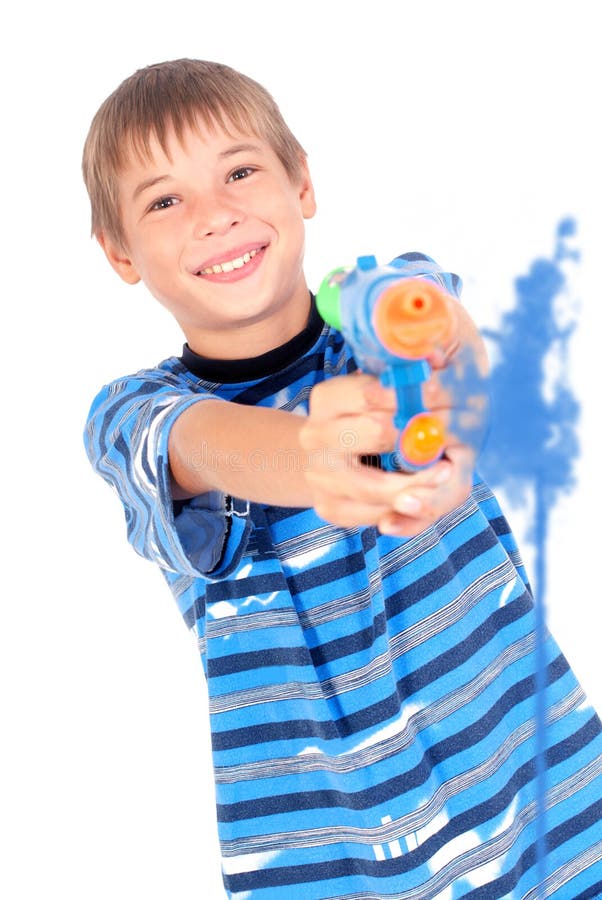 Young boy with water gun stock photo. Image of person - 23221562