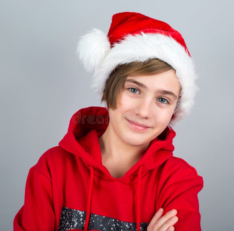 Young Boy Wearing a Santa Hat Stock Image - Image of handsome, male ...