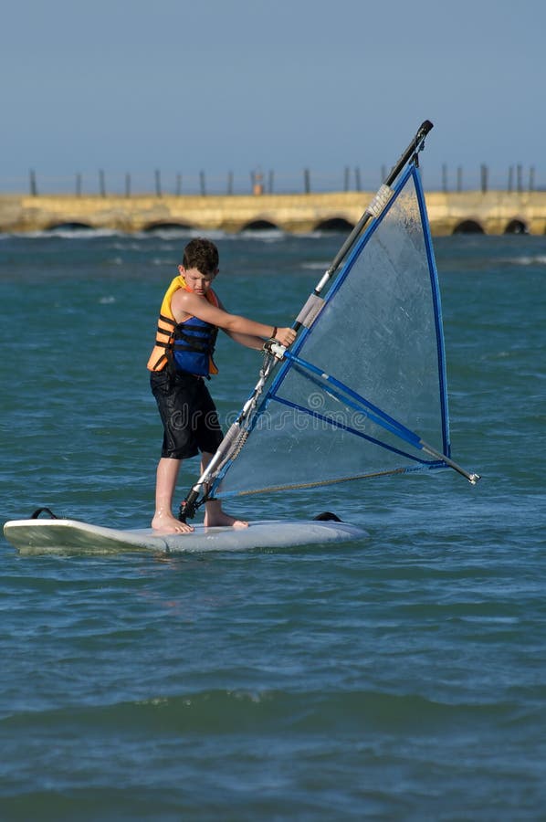 Young Boy Windsurfing and Having Fun Stock Image - Image of active ...