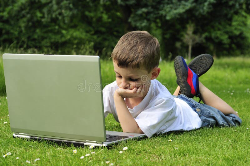 Young Boy Working on Laptop Stock Image - Image of conceptual, computer ...