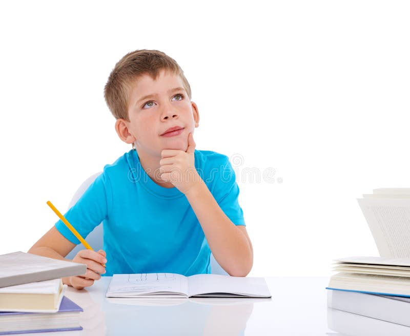 Young Boy, Writing and Thinking with Books at Desk for School ...