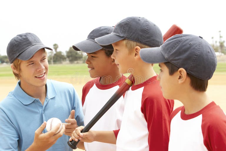 Young Boys in Baseball Team with Coach Stock Image - Image of activity ...
