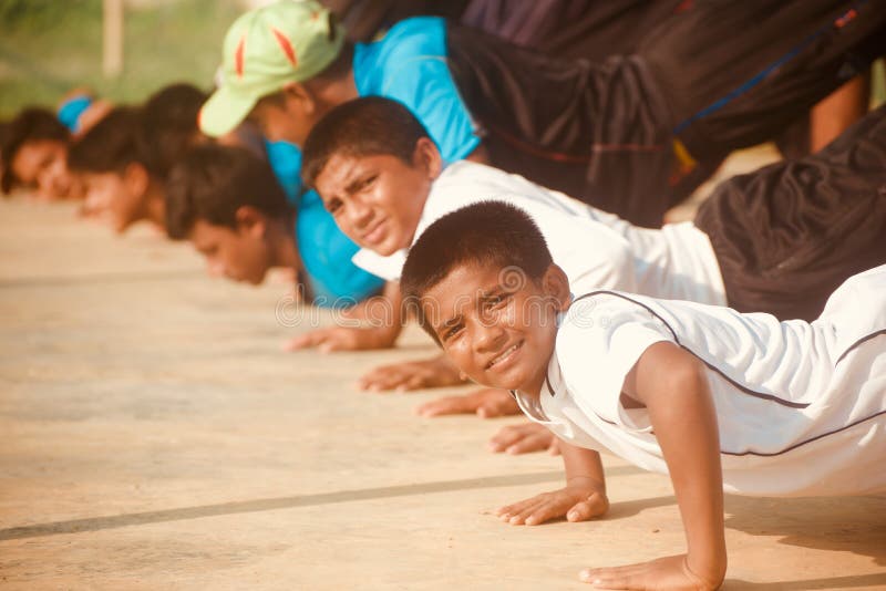 Young Boys Doing Exercise in a Group Unique Photo Editorial Stock Image ...