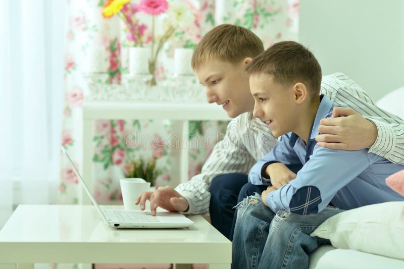 Young Boys and Laptop Computer Stock Photo - Image of brothers, email ...