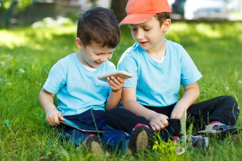 Boy Smile with Tablet Outdoor Stock Photo - Image of people, holding ...