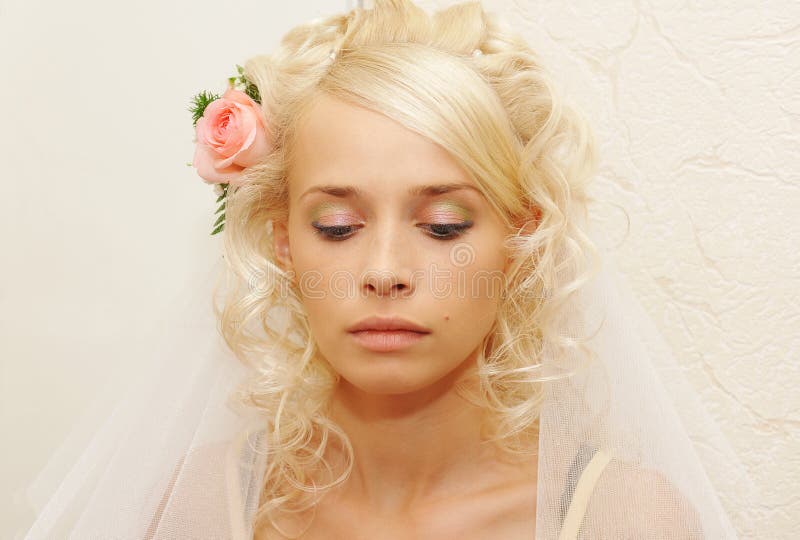 Young bride doing make-up stock photo. Image of female - 10759798