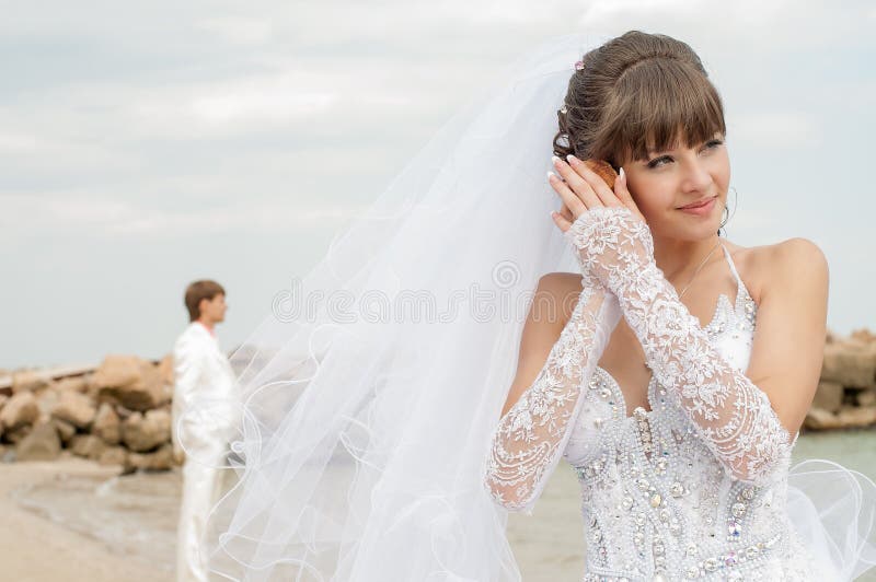 Young Bride and Groom on the Beach Stock Image - Image of celebrations ...