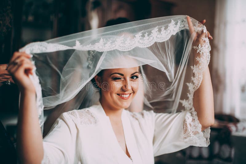 Bride Posing while Having Her First Shots of Bridal Preparation. Modern ...