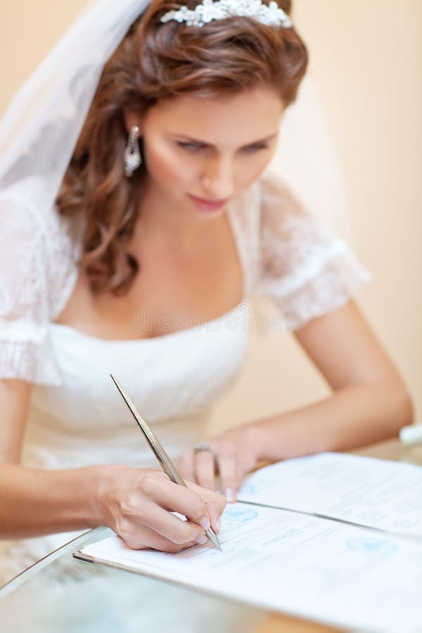 Bride Signing Marriage License Or Wedding Contract Stock Photo - Image ...