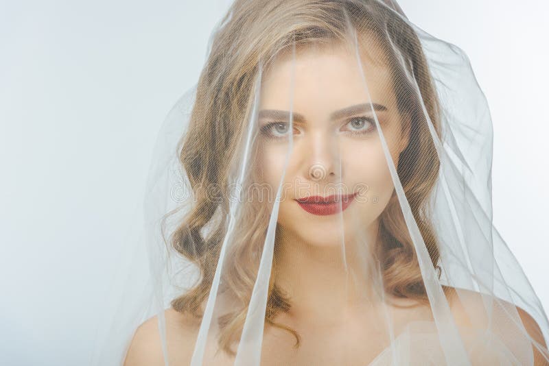 Young Bride with Veil Looking at Camera Stock Image - Image of ...