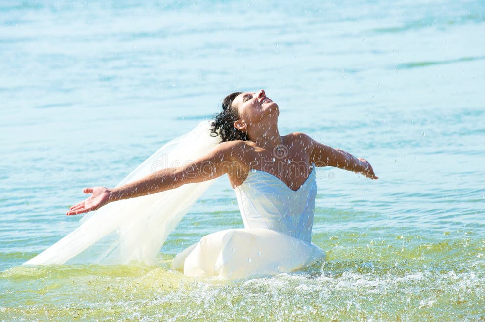 Young bride in the water stock photo. Image of beautiful - 11242948