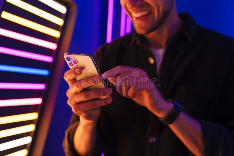 Young Bristle Man Laughing while Using Mobile Phone Stock Image - Image ...