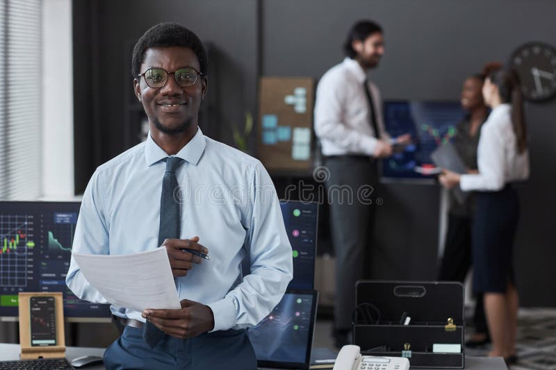 Young Broker Working with Graphs in Office Stock Photo - Image of trade ...