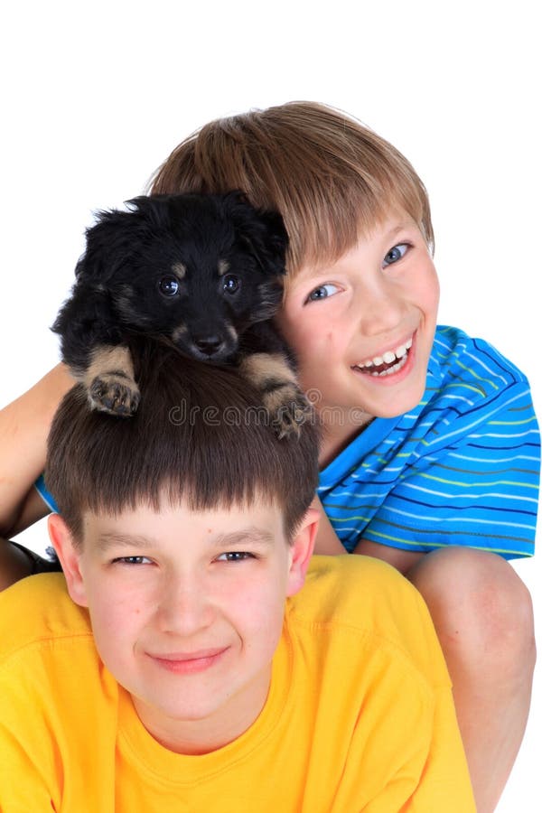 Two Brothers and Puppy Kiss Stock Image - Image of white, boys: 58730897