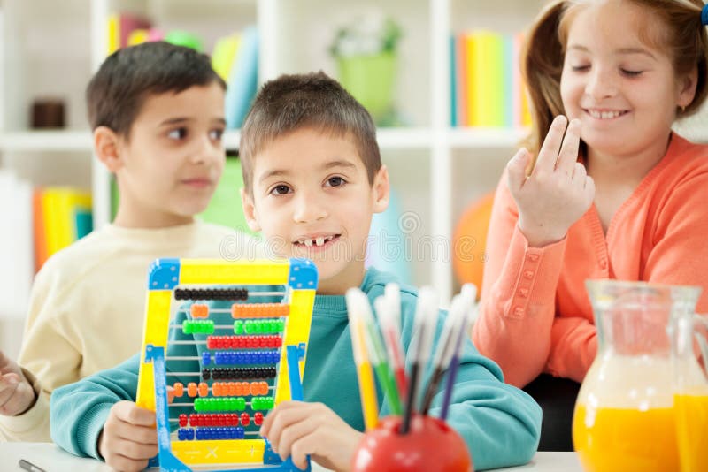 Young Brothers and Sisters Together Learn Math on Abacus Stock Image ...