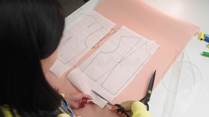 A Top-down View of the Process of How a Designer Cuts a Sheet of Paper ...