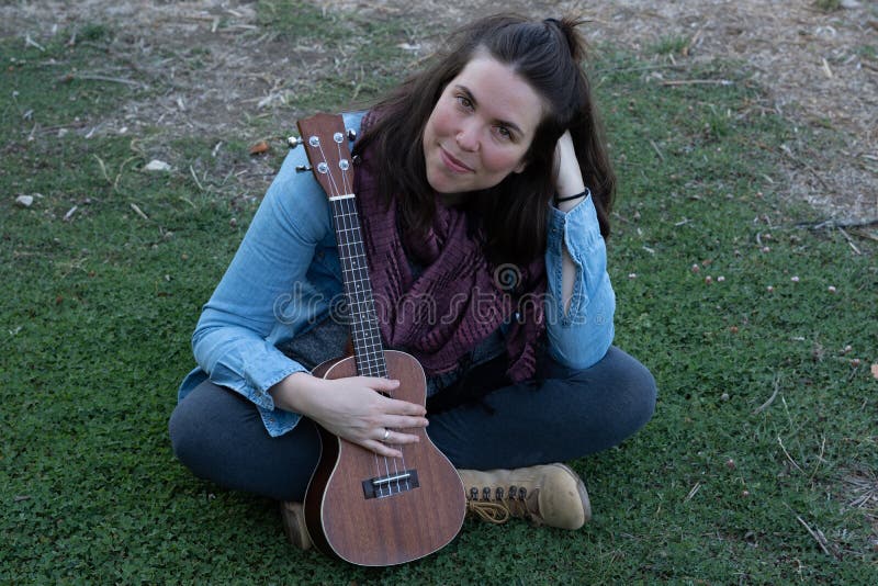 Girl Playing The Ukulele Stock Image Image Of Female 233682611