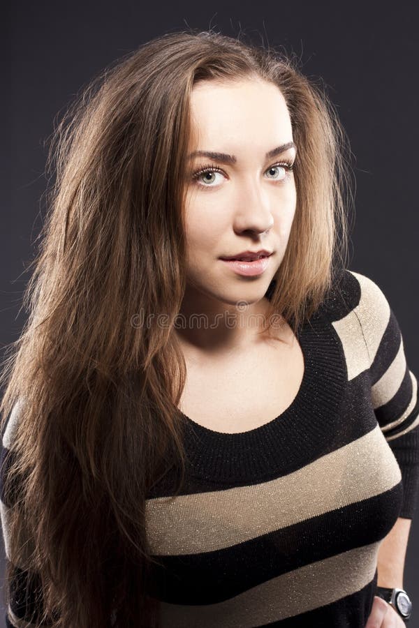 Young Brunette In A Striped Sweater Stock Image Image Of Excited