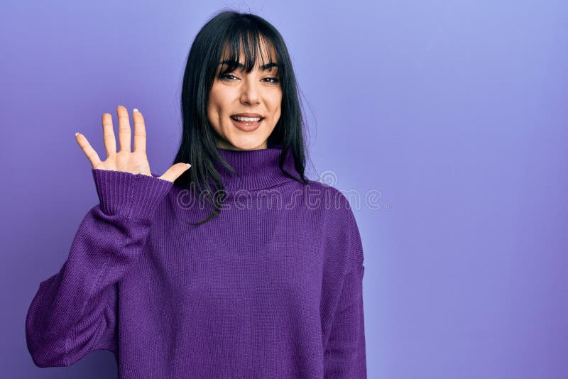 Young Brunette Woman with Bangs Wearing Turtleneck Sweater Showing and ... Young Brunette Woman with Bangs Wearing Turtleneck Sweater Showing and ...