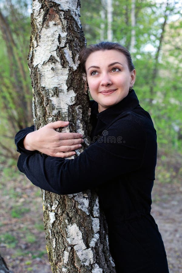 Portrait of Young Brunette Woman Hugging a Tree Stock Image - Image of ...