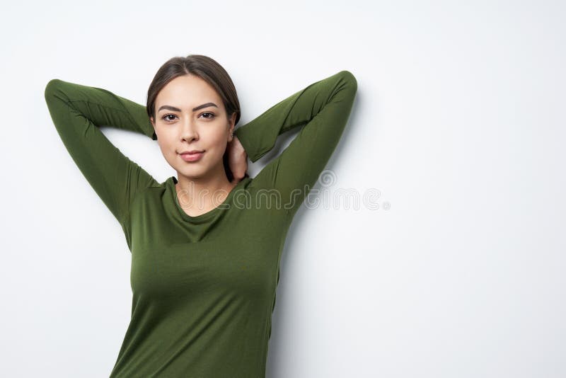 Young Brunette Woman Posing with Hands Over Head Stock Photo - Image of ...