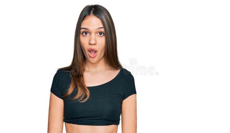 Young Brunette Woman Wearing Casual Clothes Afraid And Shocked With
