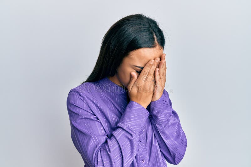Young Brunette Woman Wearing Casual Clothes With Sad Expression