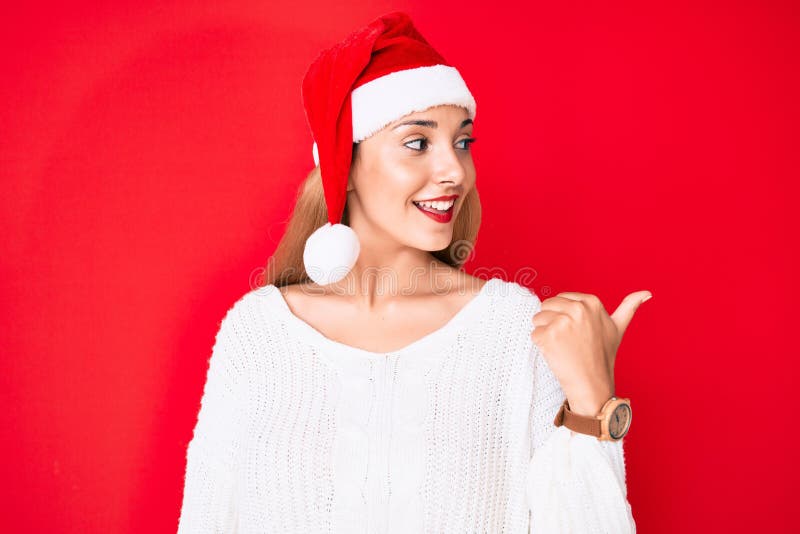 Young Brunette Woman Wearing Christmas Hat Smiling With Happy Face