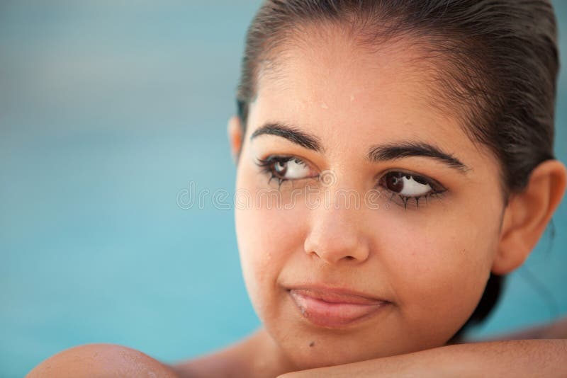 Young Brunette Woman Wet in the Pool Stock Photo - Image of blue, hair ...