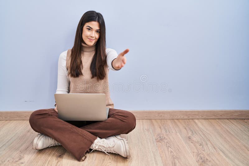 Young Brunette Woman Working Using Computer Laptop Sitting on the Floor ... Young Brunette Woman Working Using Computer Laptop Sitting on the Floor ...