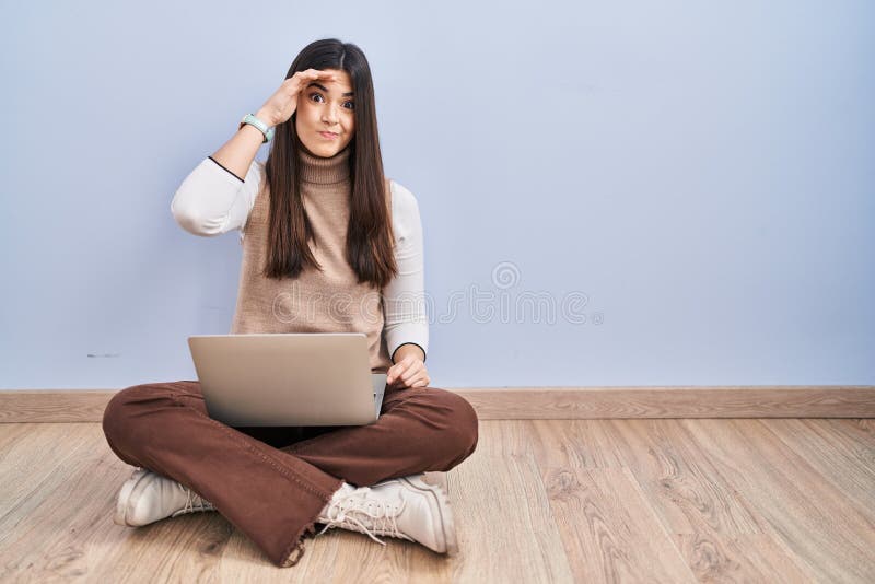 Young Brunette Woman Working Using Computer Laptop Sitting On The Floor