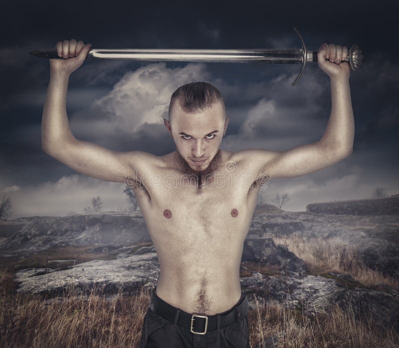 Young Brutal Man with Sword Over Cloudy Background Stock Image - Image ...