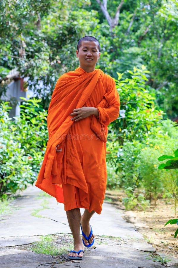 Young Buddhist Monk Walking Next To the Temple Stock Photo - Image of ...