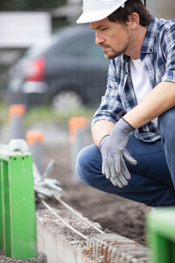 Young Builder Laying Foundation Base Stock Image - Image of footpath ...