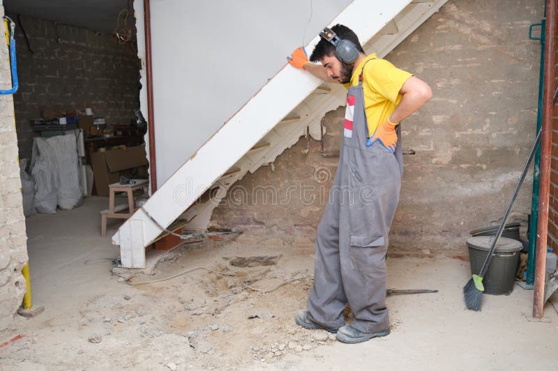 Young Builder Thinking How To Solve a Problem at the Construction Site ...