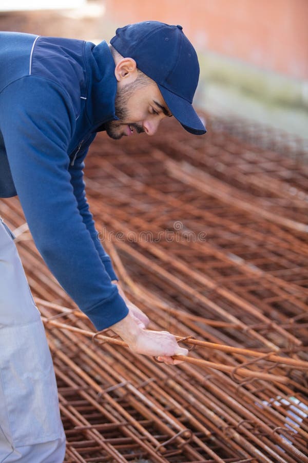 Young Builder Working on Building Foundations Stock Image - Image of ...