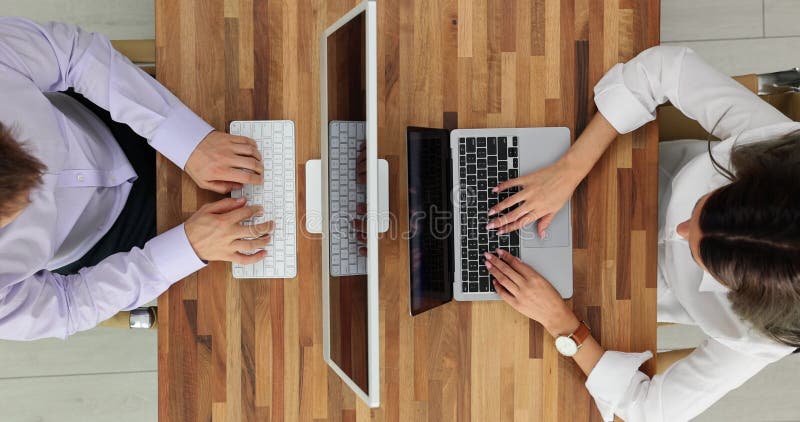 Young Business Colleagues Working at Computers in Office Top View Stock ...