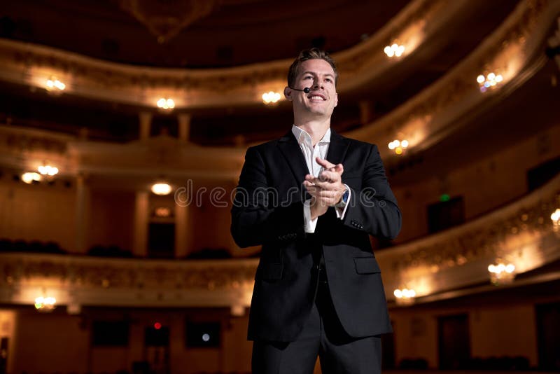 Young Business Couch Standing on Stage Clapping Hands, Keep Hands ...