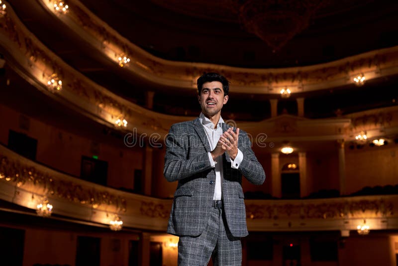 Young Business Couch Standing on Stage Clapping Hands, Keep Hands ...