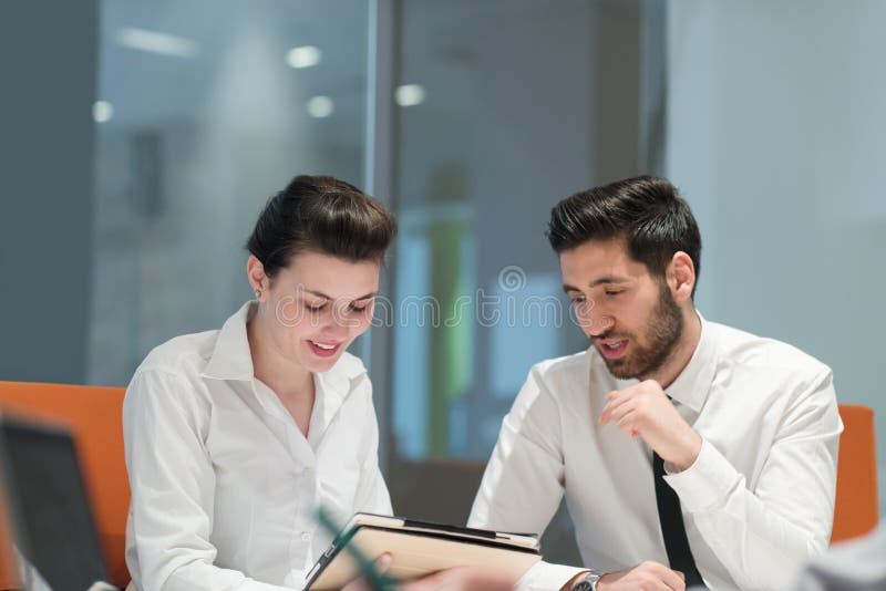 Young Business Couple Working Together on Project Stock Photo - Image ...