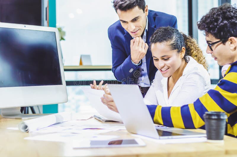 Young Business Design Team Having a Meeting Together Stock Photo ...