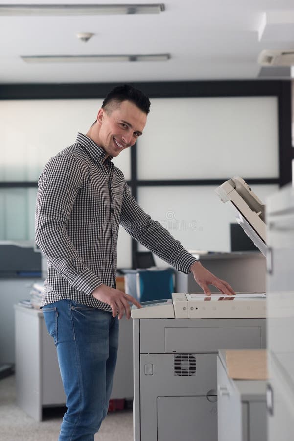 Young Business Man Copy Documents Stock Image - Image of copier, color ...