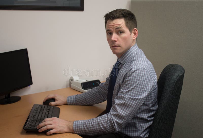 Young Business Man at Desk in Office Stock Image - Image of business ...